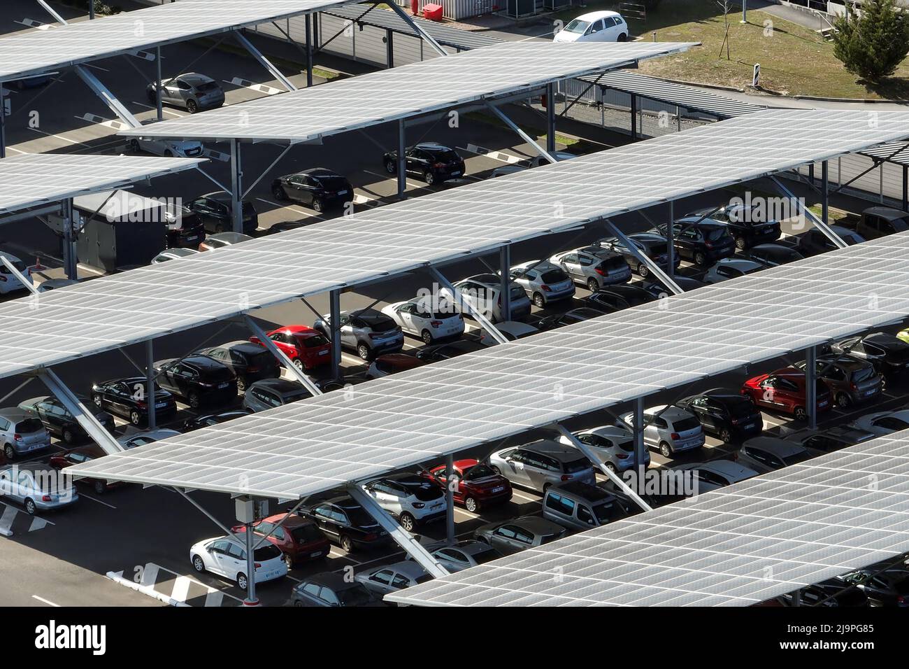 Aerial view of solar panels installed as shade roof over parking lot ...