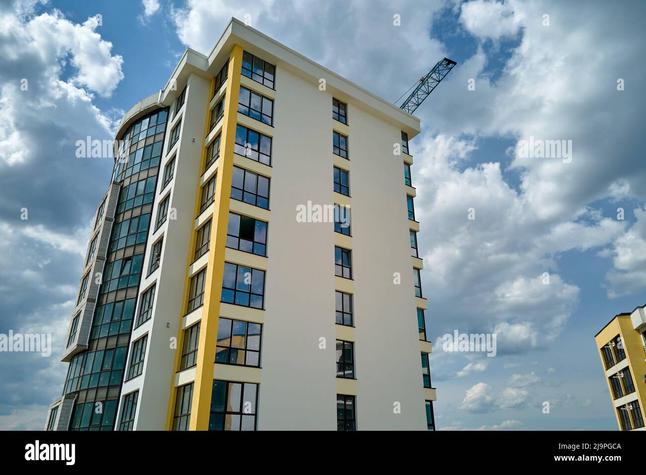 Architectural details of modern high apartment building facade with ...
