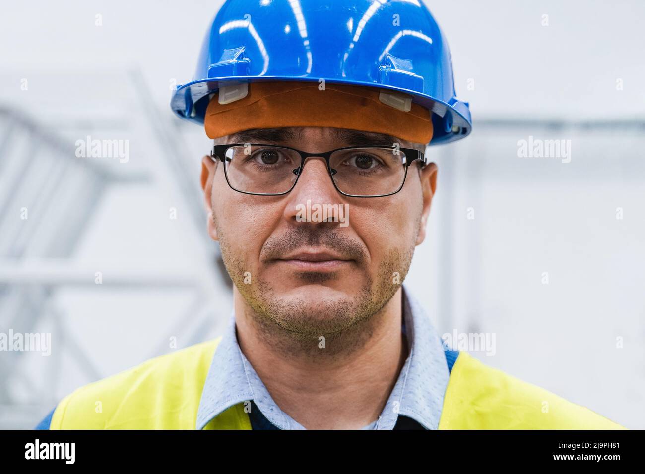 Engineer working inside automation and robotics facility - New ...