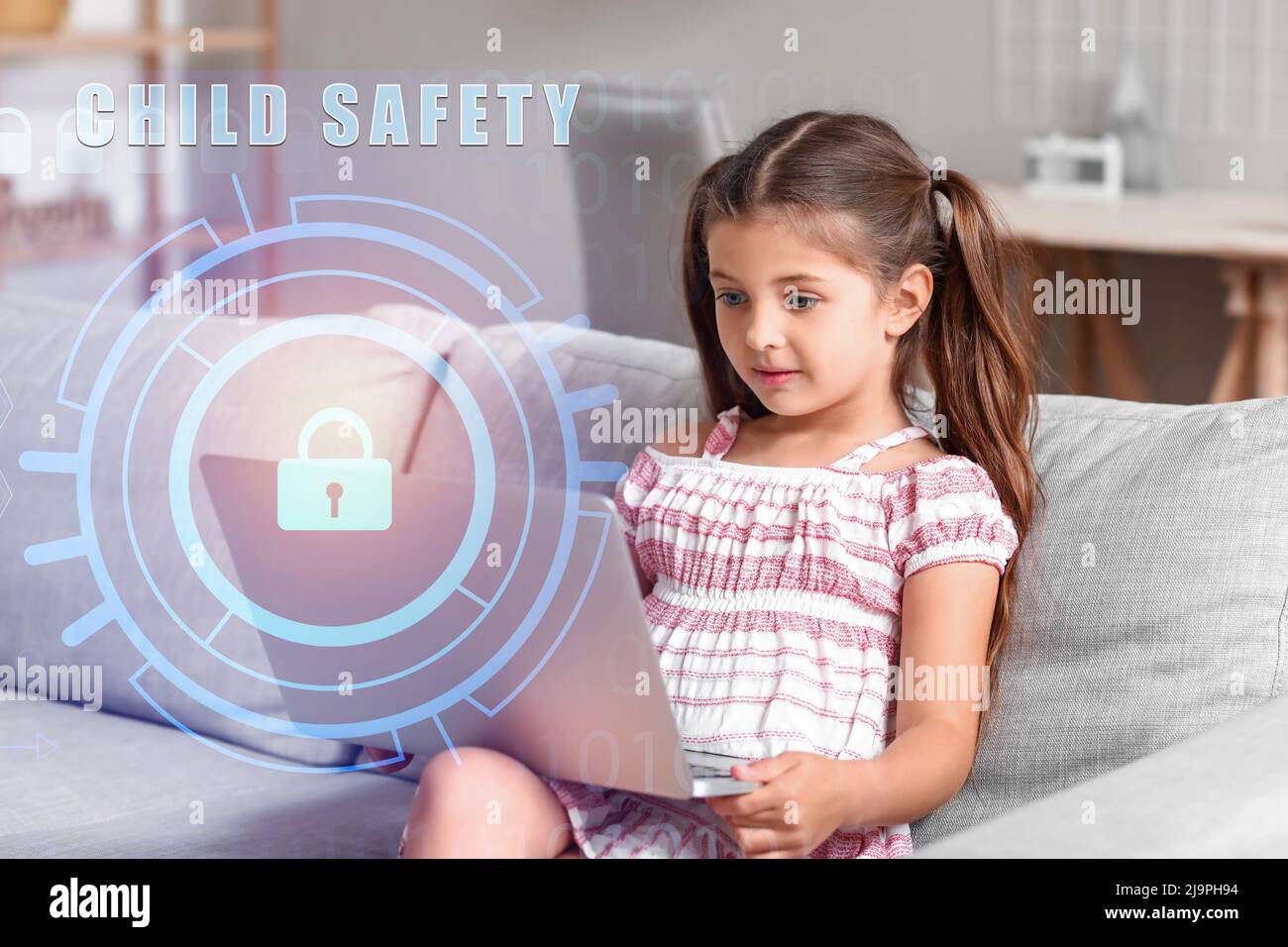 Cute little girl with laptop at home. Concept of safety and parental ...