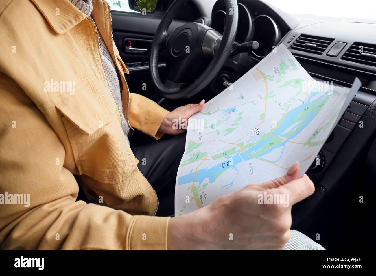 Female driver city map hi-res stock photography and images - Alamy