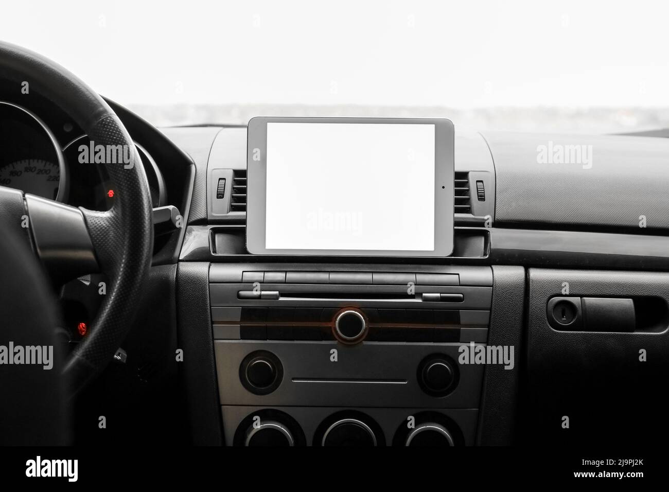 Tablet computer for navigation in modern car Stock Photo - Alamy