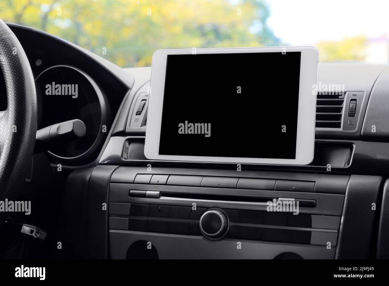 Tablet computer for navigation in modern car Stock Photo - Alamy