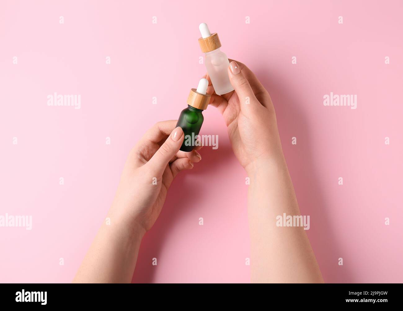Female hands applying serum hi-res stock photography and images - Alamy