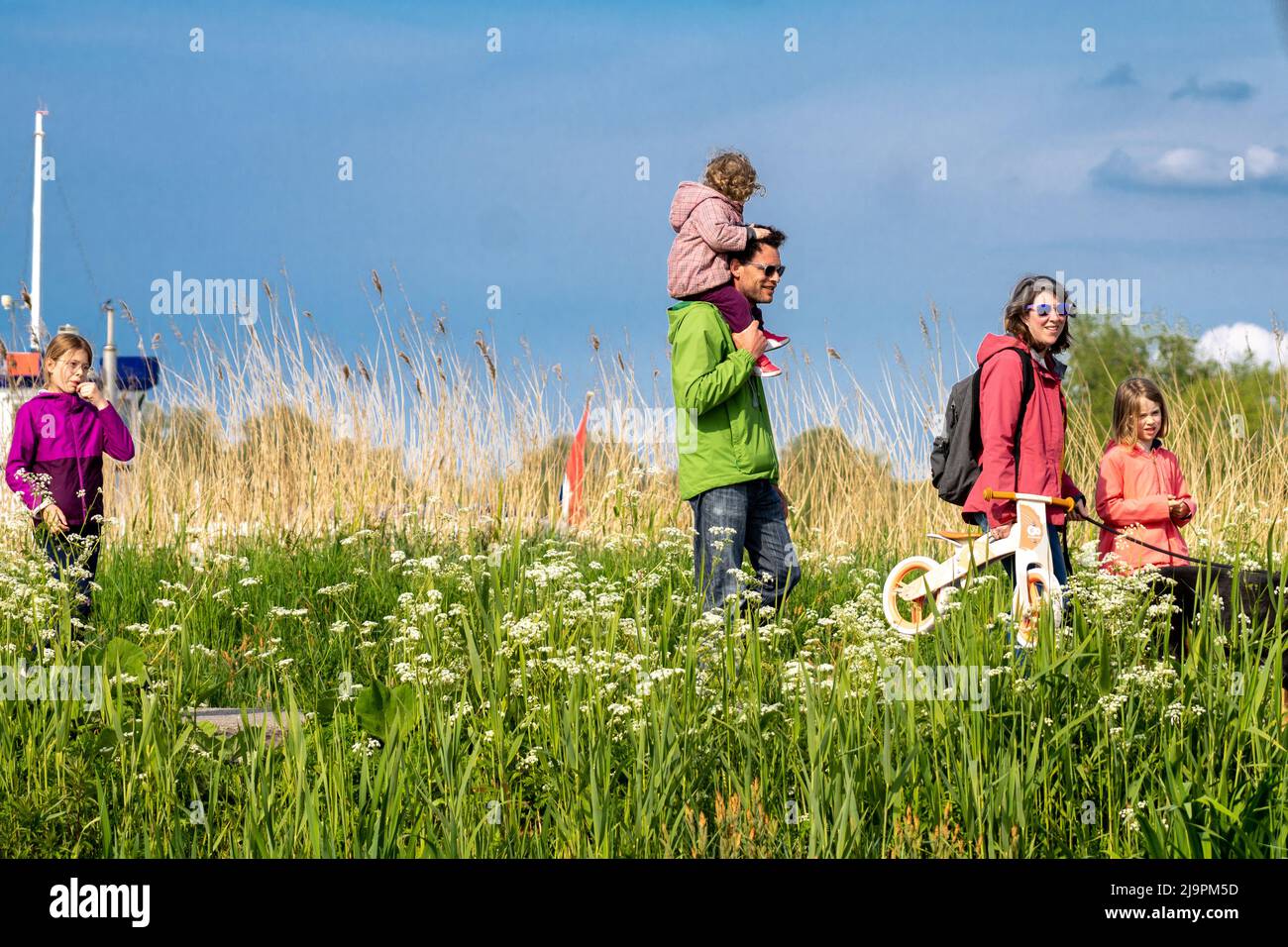A Family enjoys the day at Kinderdijk in South Holland, Netherlands ...