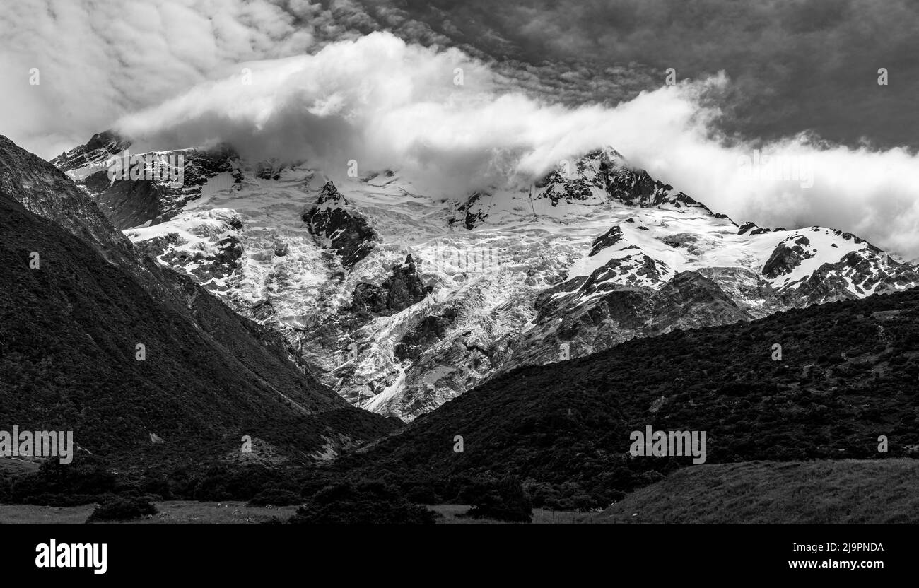 Mt Sefton shrouded in clouds. Mt Sefton will catch your eye on the way ...