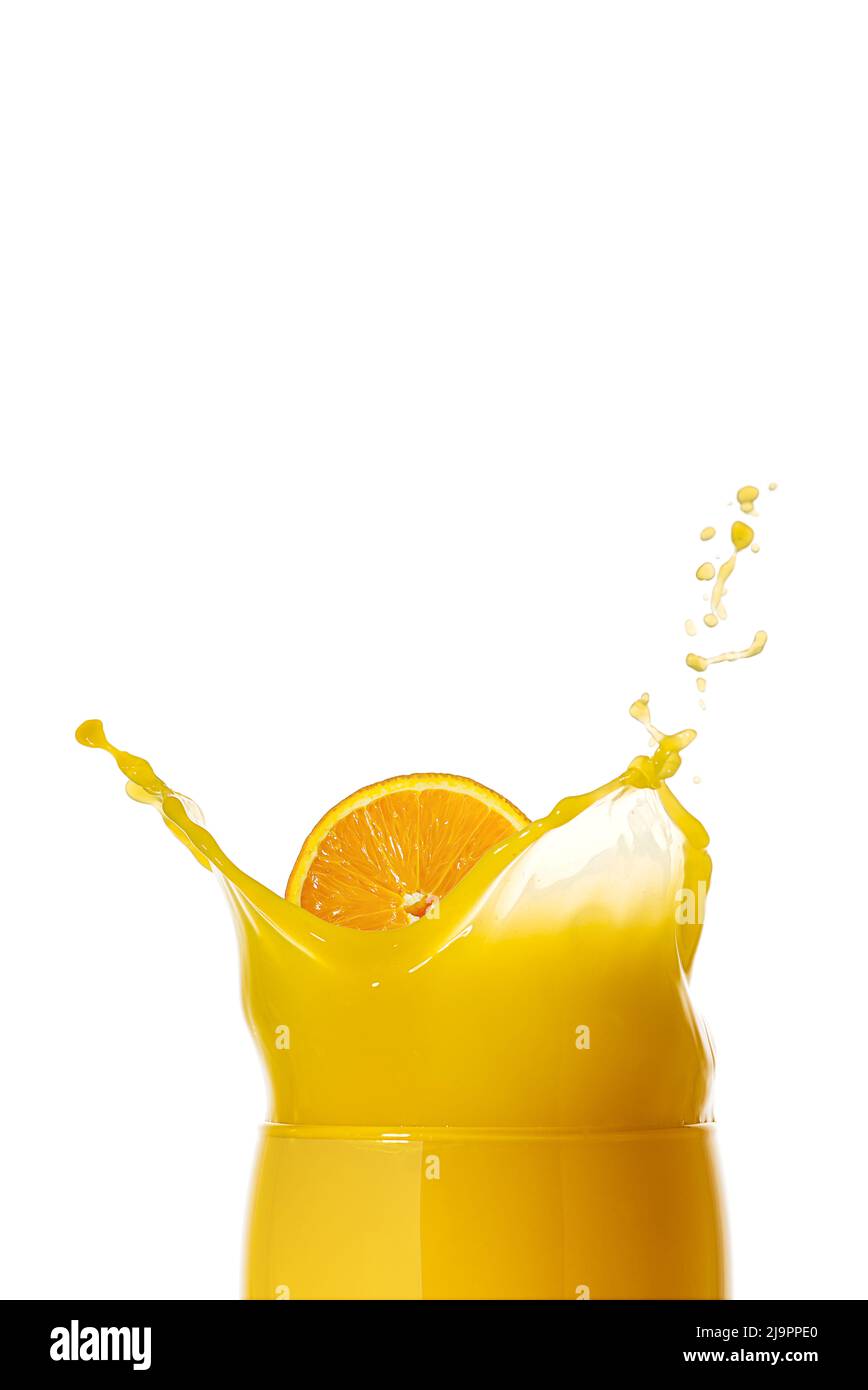 orange juice splash isolated on white. glass of splashing orange juice ...