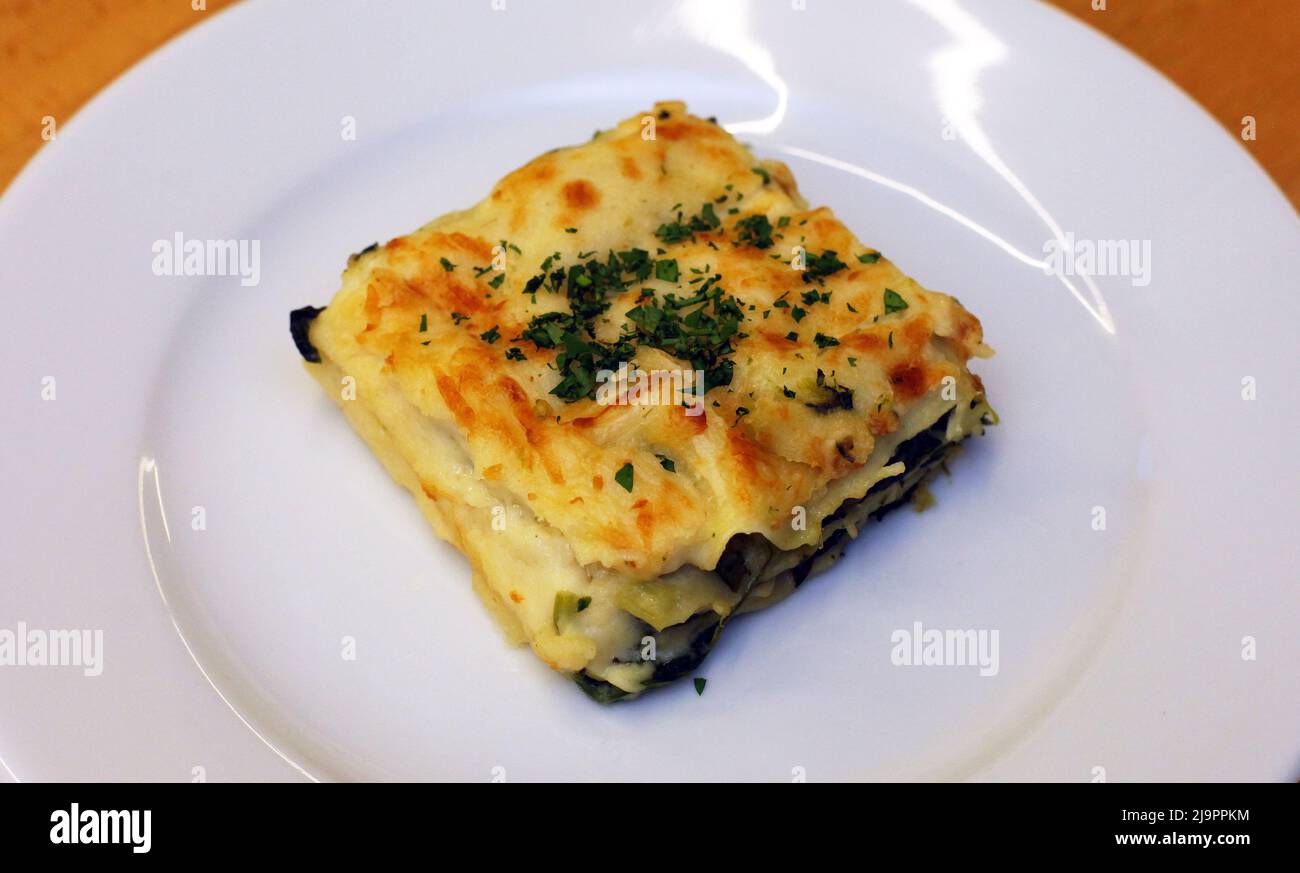 Traditional Turkish food 'Spinach Pastry' (Ispanakli Borek) with yogurt ...