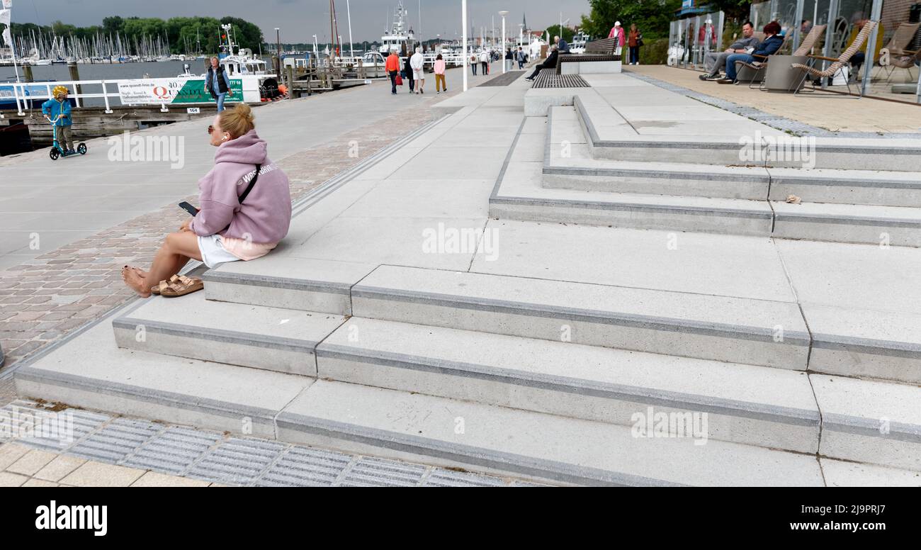 24 May 2022, Schleswig-Holstein, Lübeck-Travemünde: Brightly paved ...