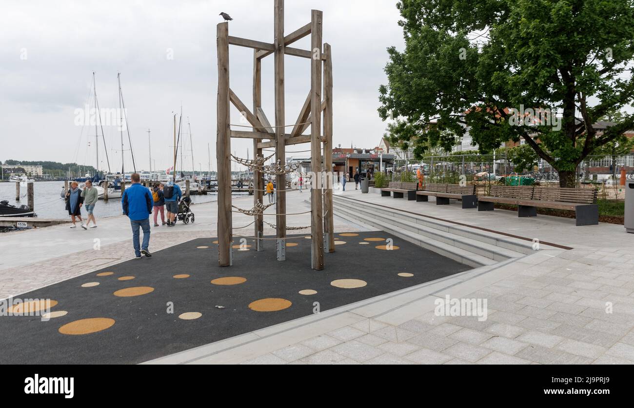 24 May 2022, Schleswig-Holstein, Lübeck-Travemünde: Brightly paved ...