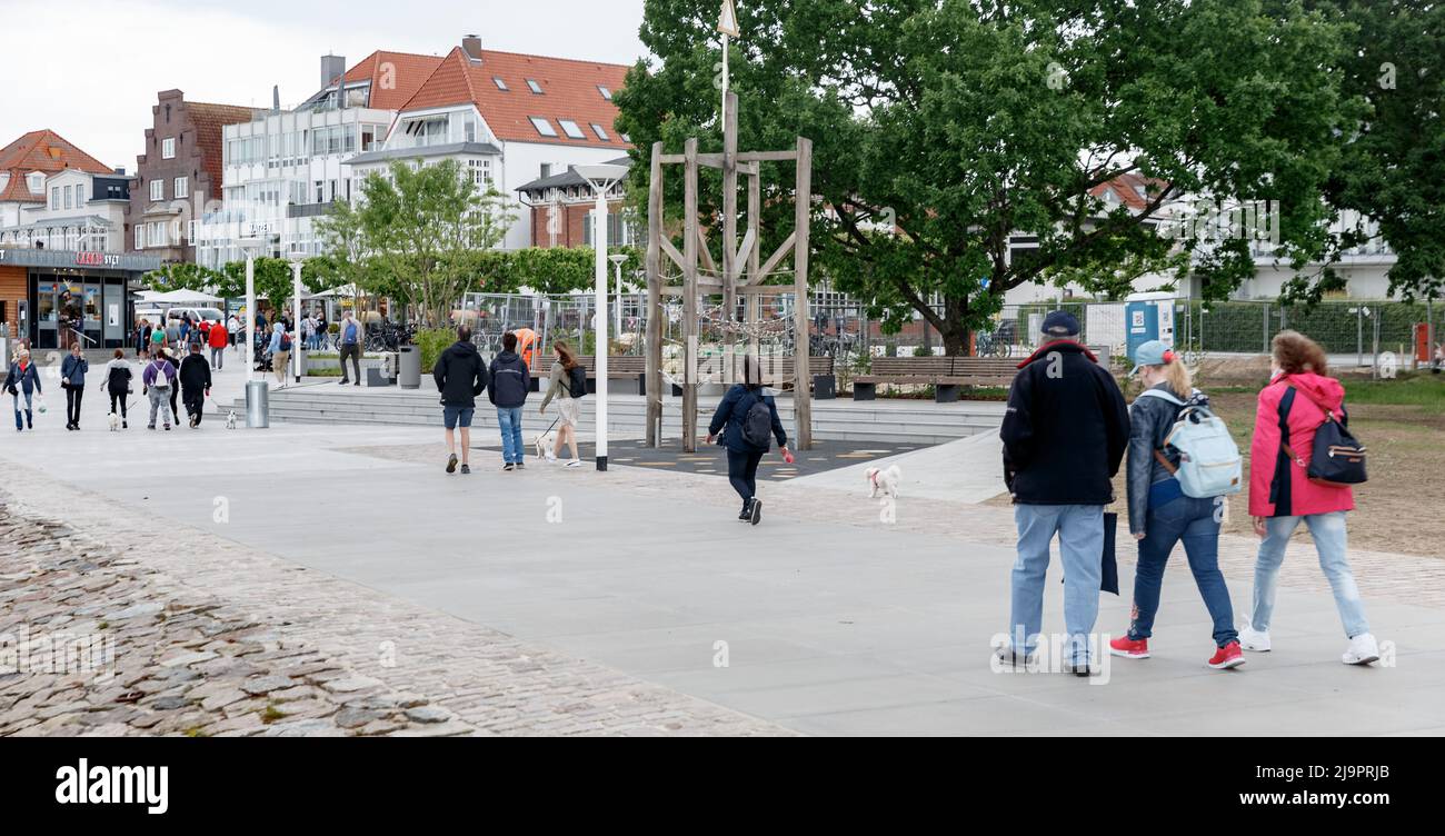 24 May 2022, Schleswig-Holstein, Lübeck-Travemünde: Brightly paved ...