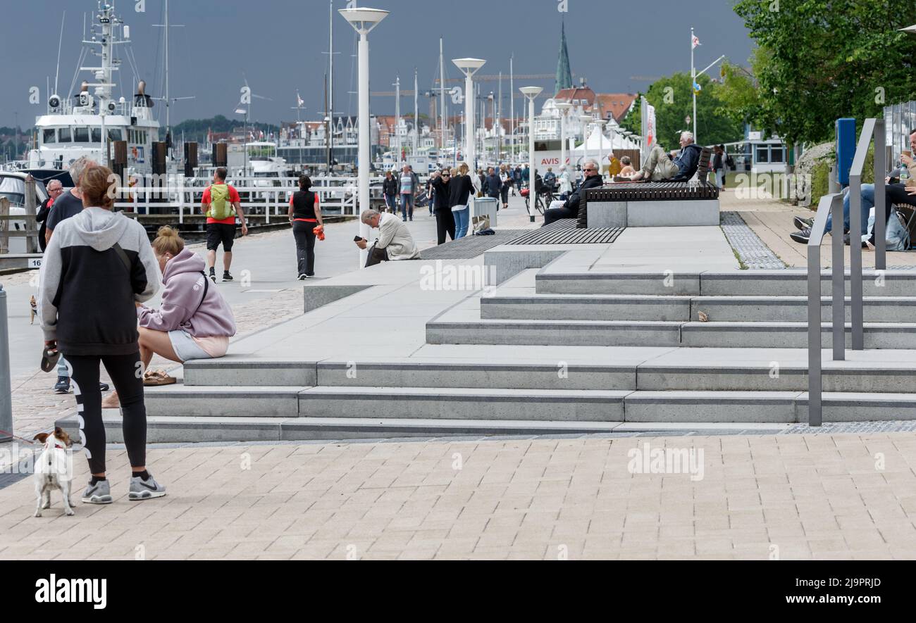 24 May 2022, Schleswig-Holstein, Lübeck-Travemünde: Brightly paved ...