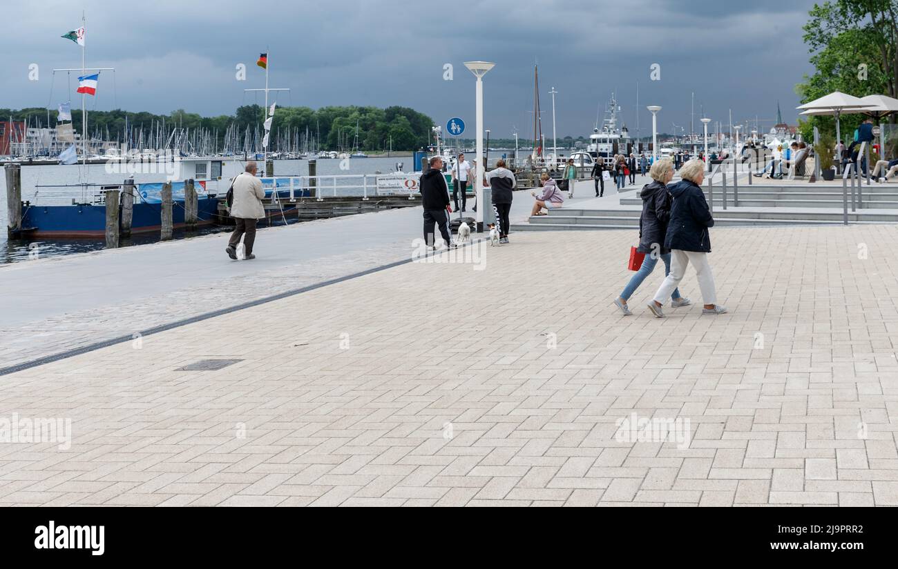 24 May 2022, Schleswig-Holstein, Lübeck-Travemünde: Brightly paved ...