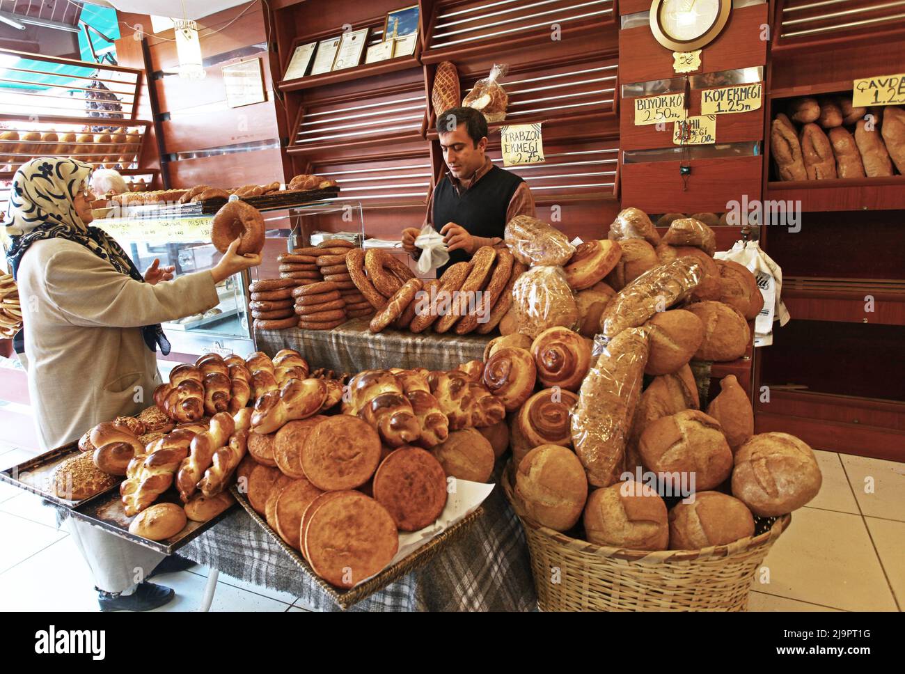 Woman eating bread plain hi-res stock photography and images - Alamy