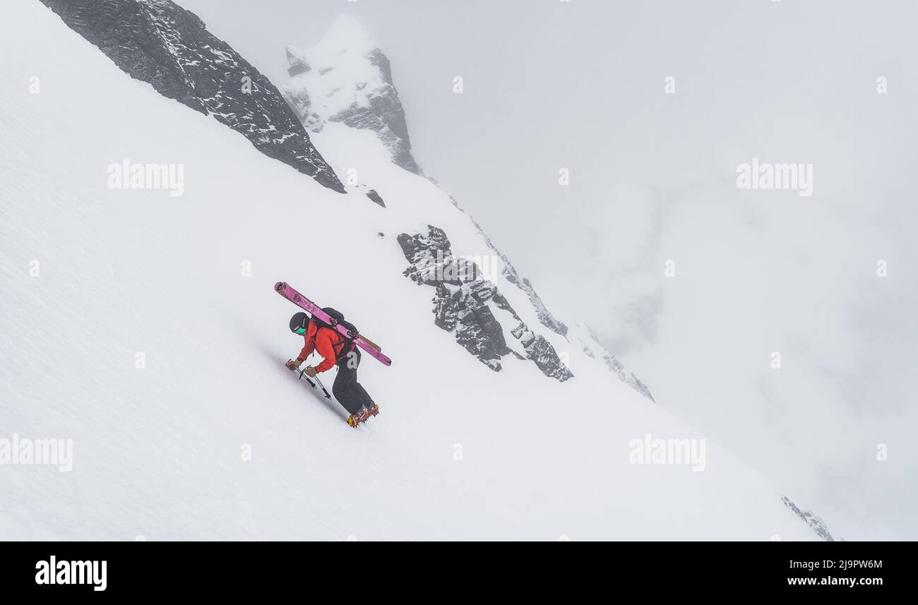 Climbing the steep slope of Single Cone. The Remarkables range offers ...