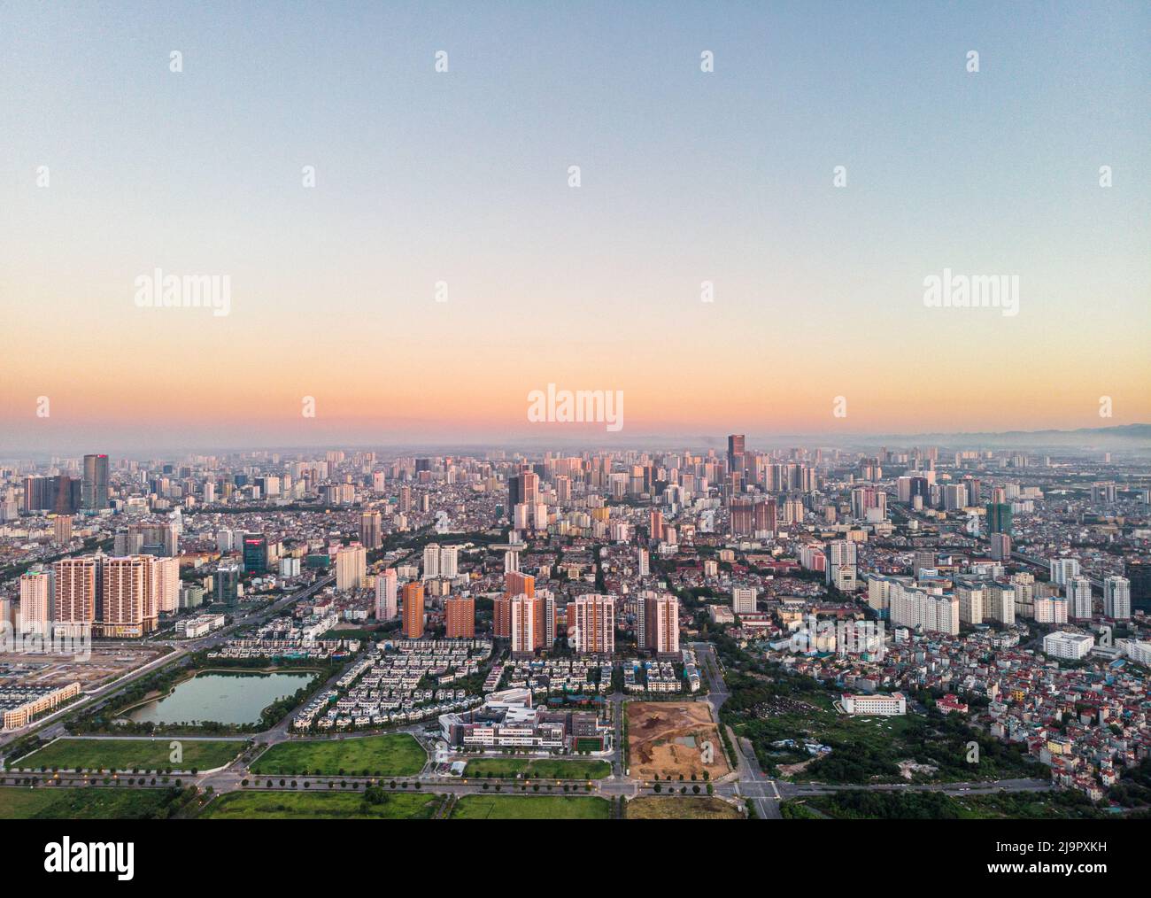 Aerial view of Hanoi city in sunset. West lake in the foreground Stock ...