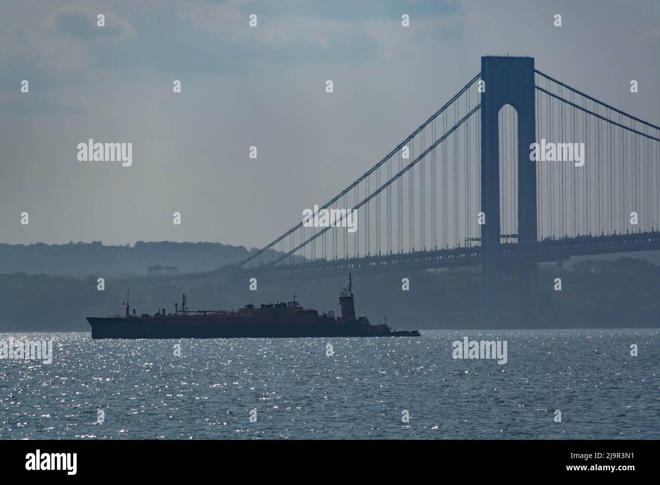 Verrazano Bridge in Brooklyn on a hot summer day. The Verrazano Bridge ...