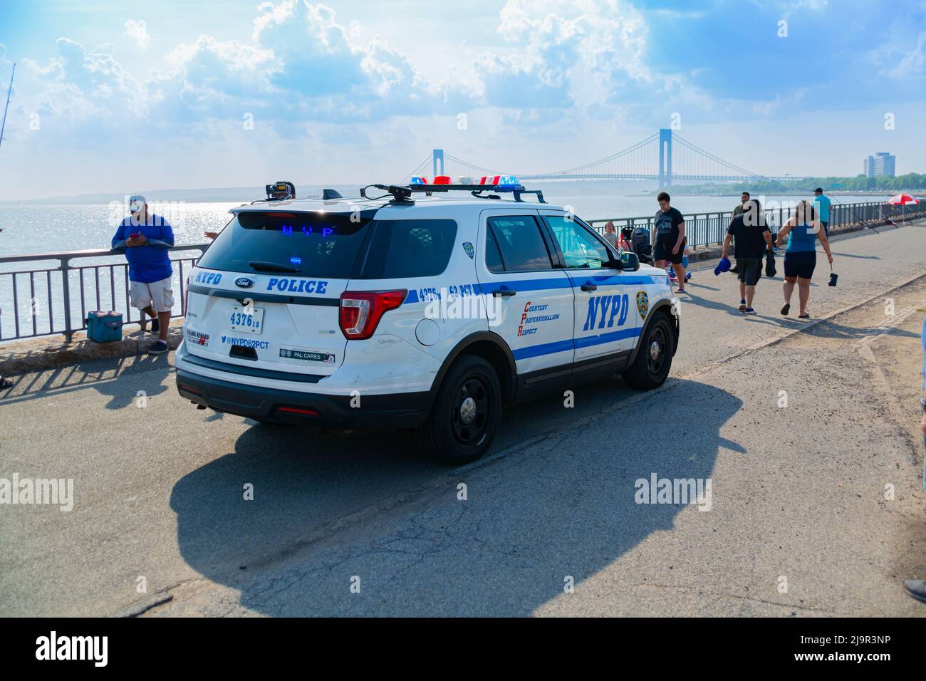 An NYPD car is patrolling the Cesar's bay area in Benson Hurst Brooklyn ...