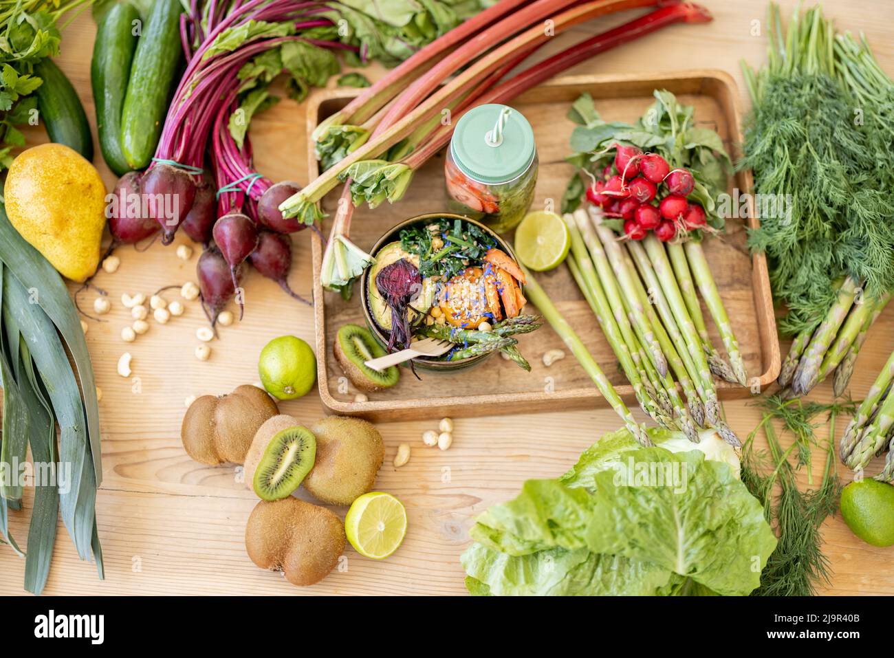 Table full of fresh food ingredients Stock Photo - Alamy