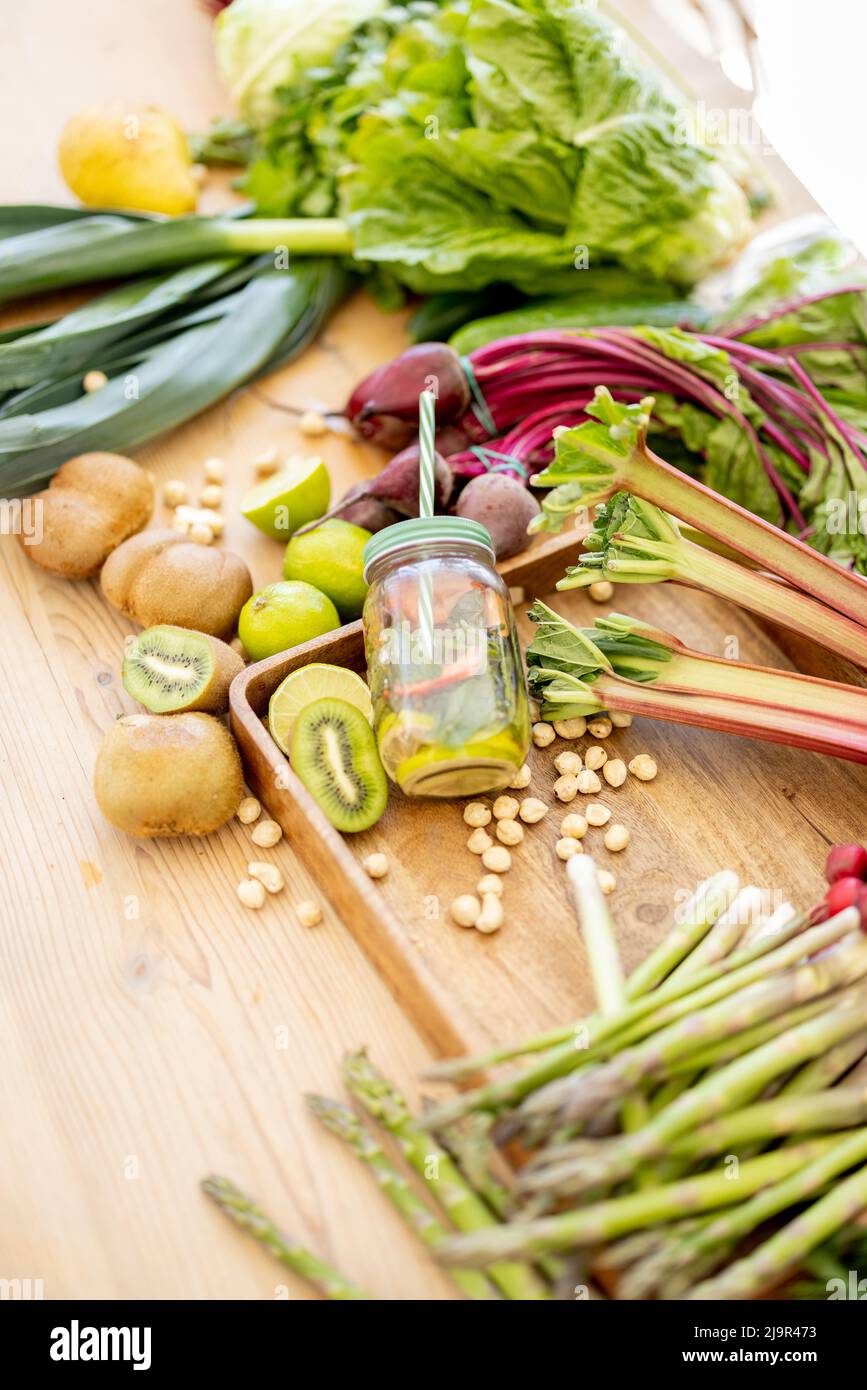 lemonade on a tray full of fresh vegan raw food ingredients Stock Photo ...