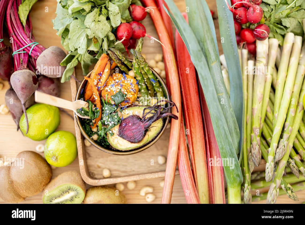 Table full of fresh food ingredients Stock Photo - Alamy