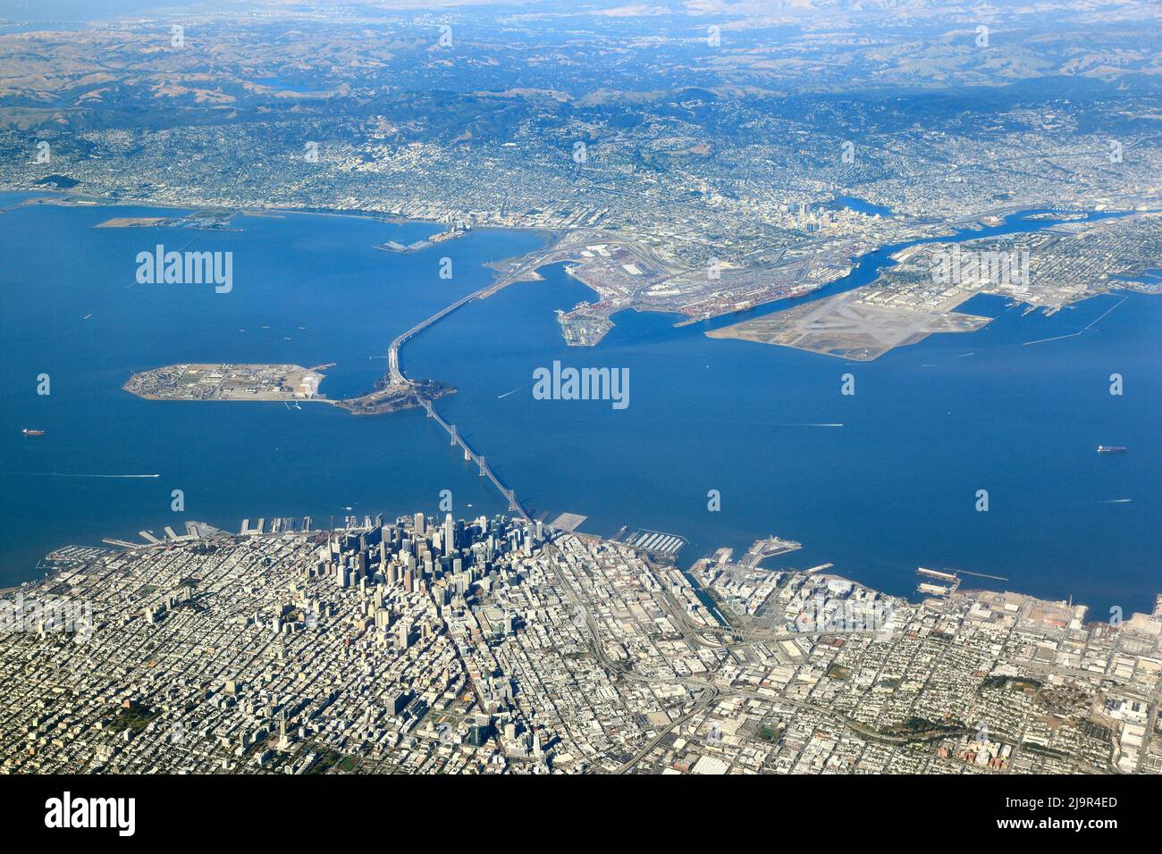 Aerial View of San Francisco looking east over the bay towards Oakland ...