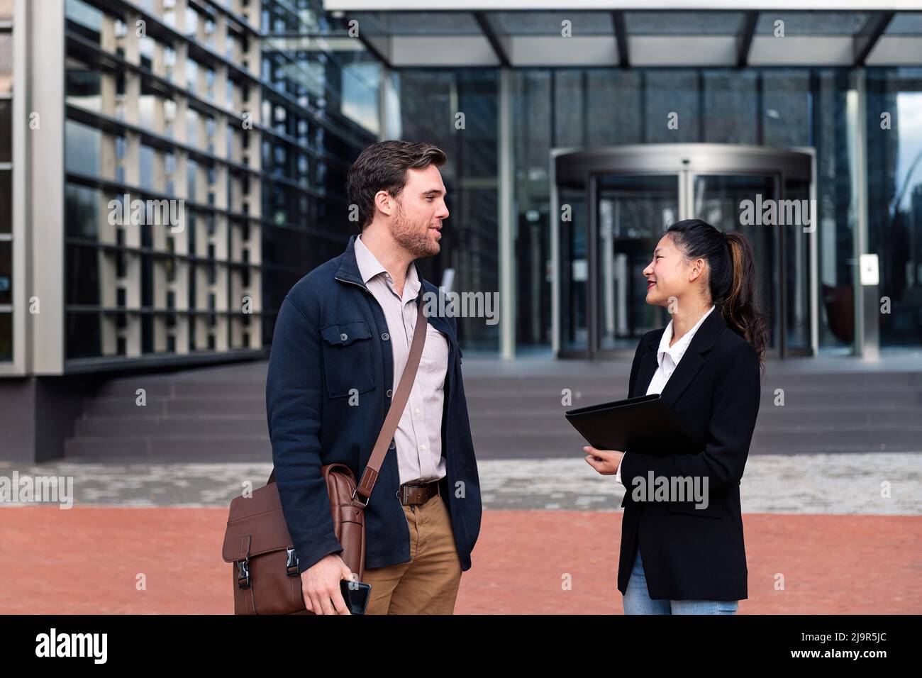 Man woman office entrance hi-res stock photography and images - Alamy