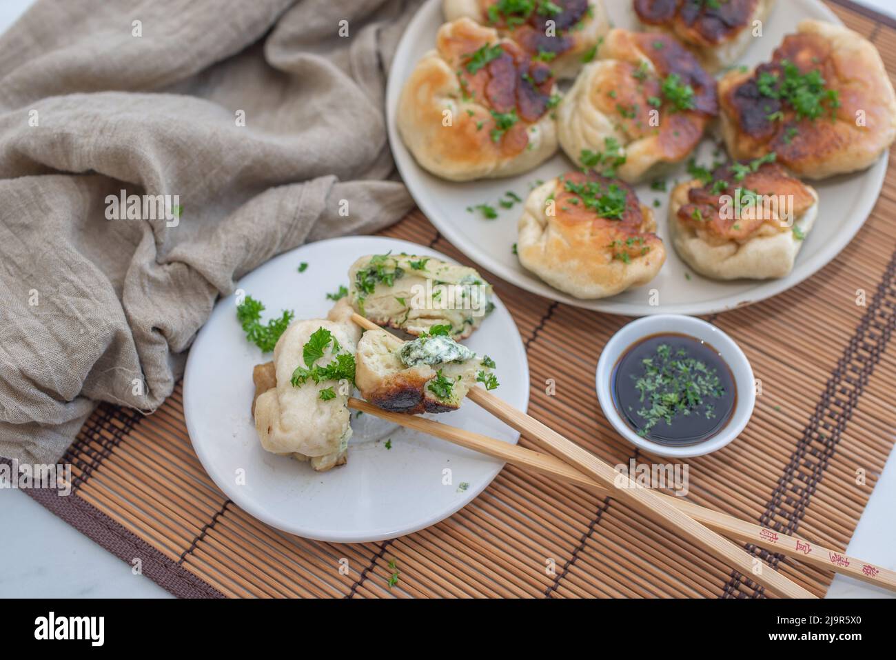 Shanghai pan fried pork dumpling with wild garlic Stock Photo - Alamy