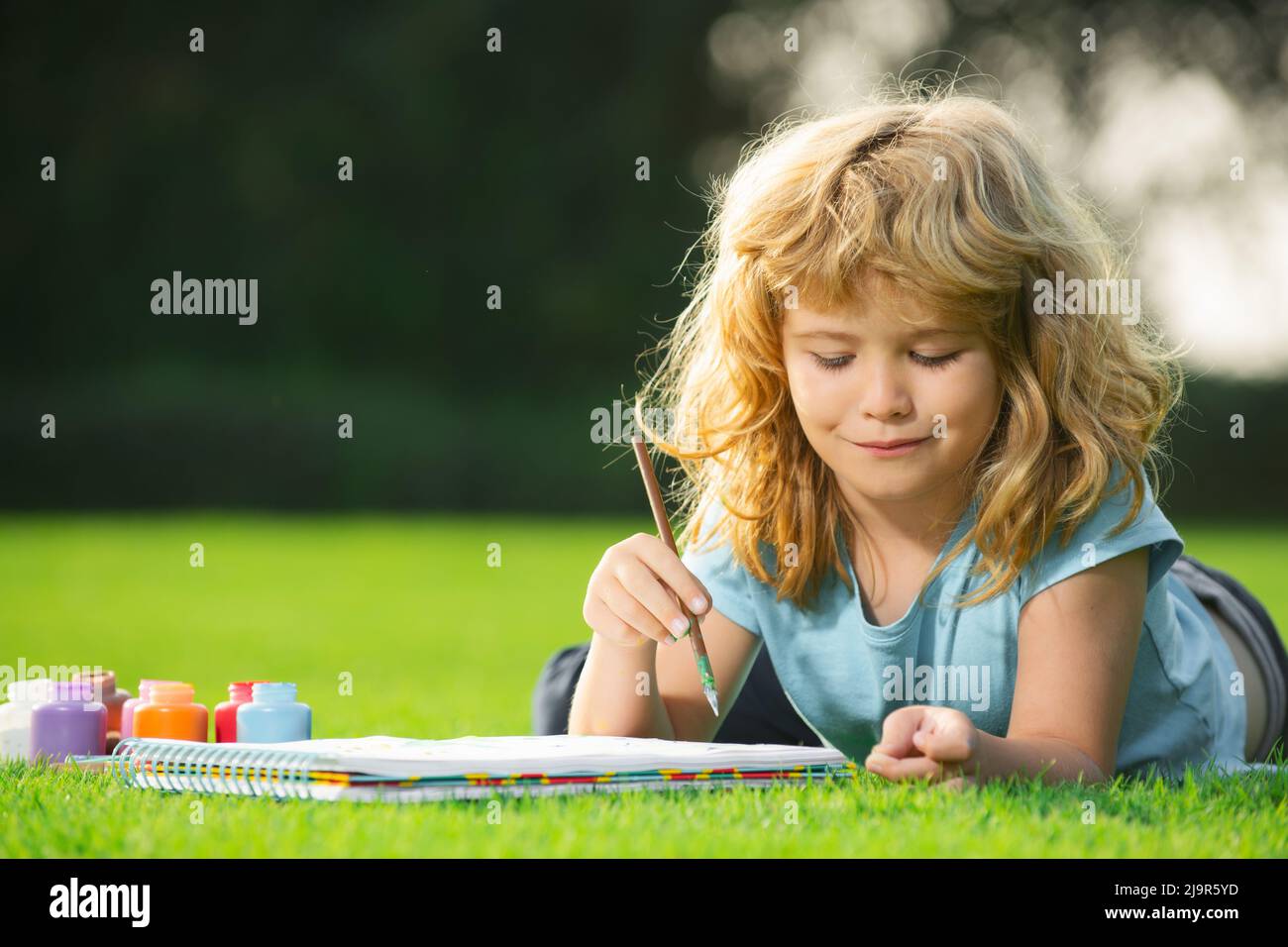 Children create artist paints creativity vacation. Schooler kids ...