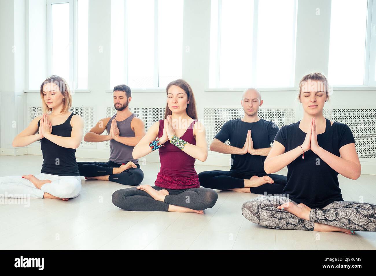 Groups Of People Meditating