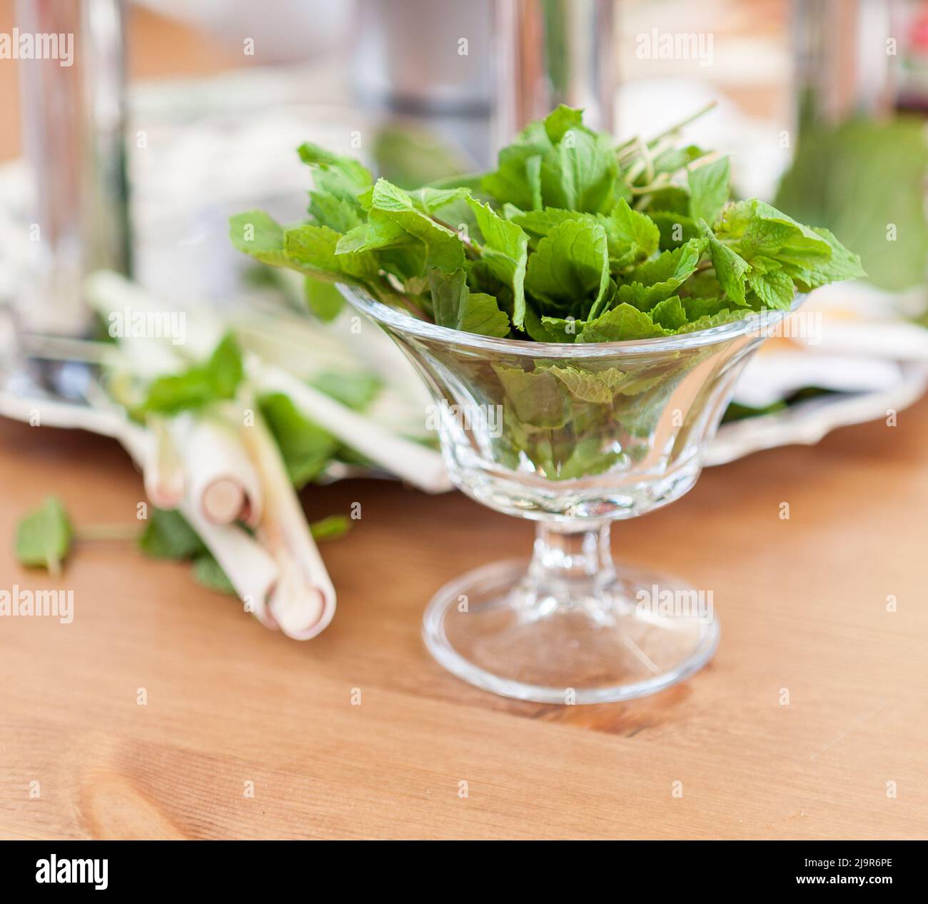 Glass with fresh green mint for drinks Stock Photo - Alamy