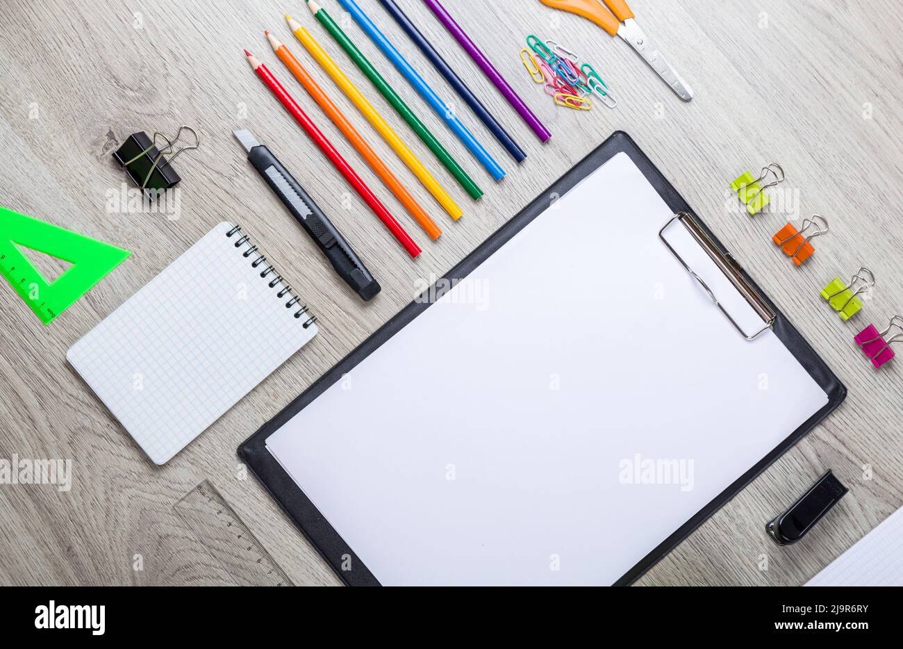 school supplies with pencils, paint pens paper scissors and rulers ...