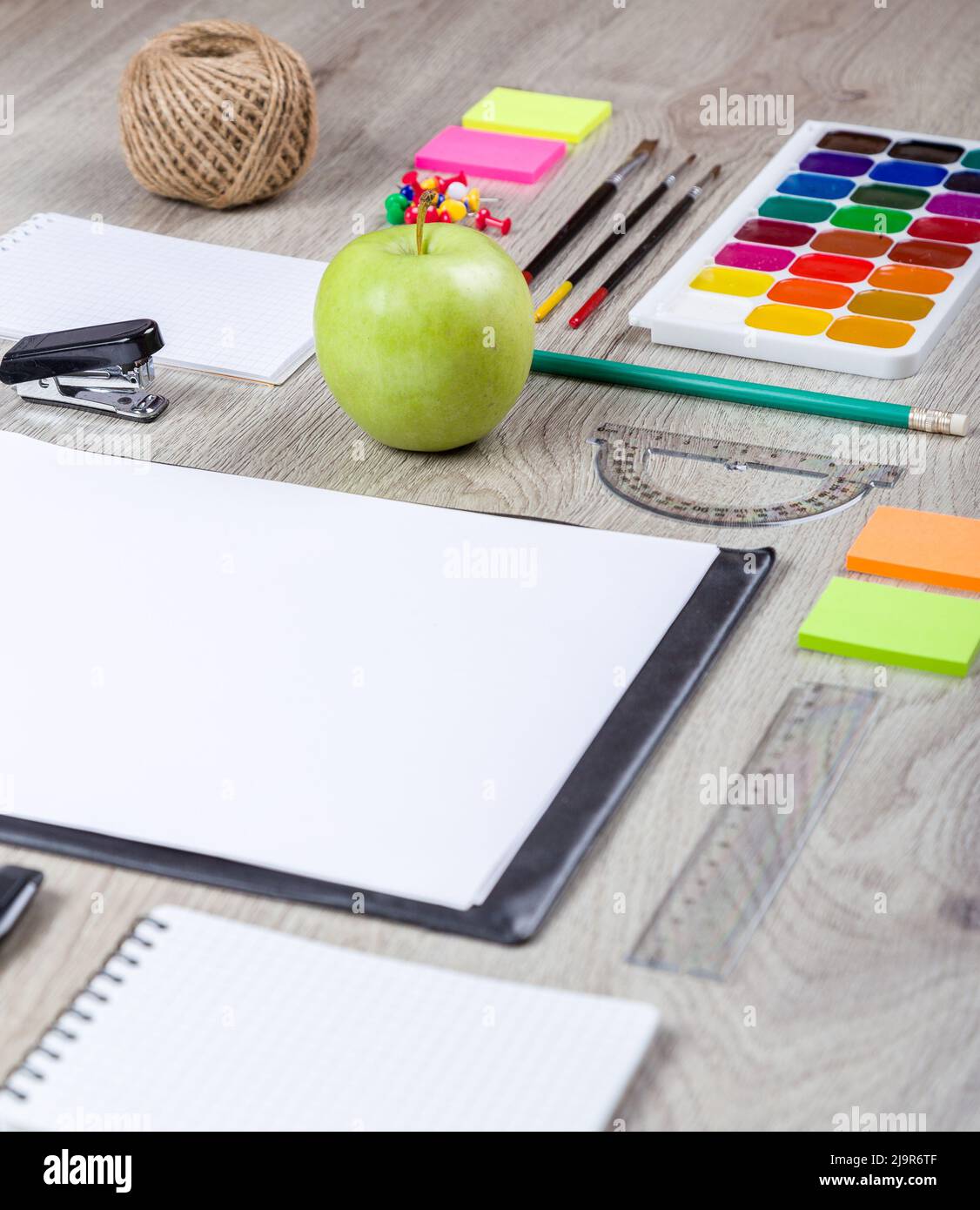 school supplies with pencils, paint pens paper scissors and rulers ...