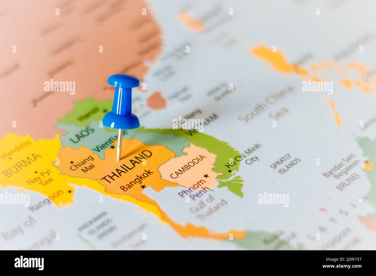 Blue push pin pointing at Thailand on a political world map Stock Photo ...