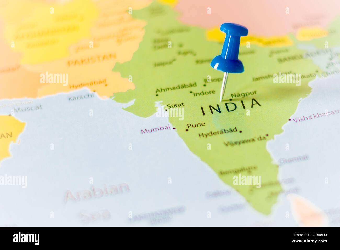 Blue push pin pointing at India on a political world map Stock Photo ...