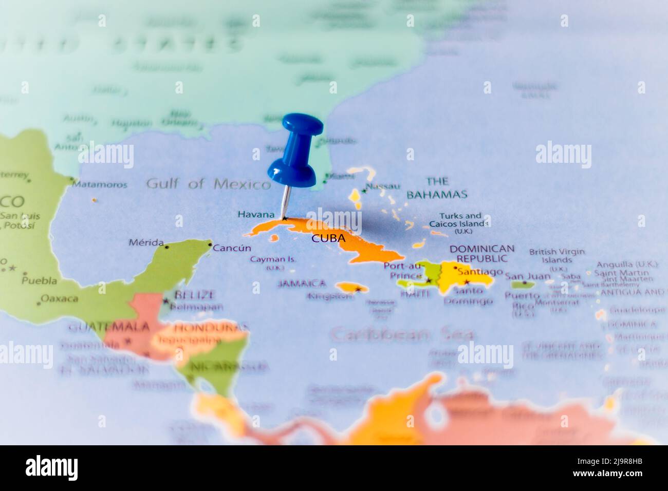 Blue push pin pointing at Cuba on a political world map Stock Photo - Alamy