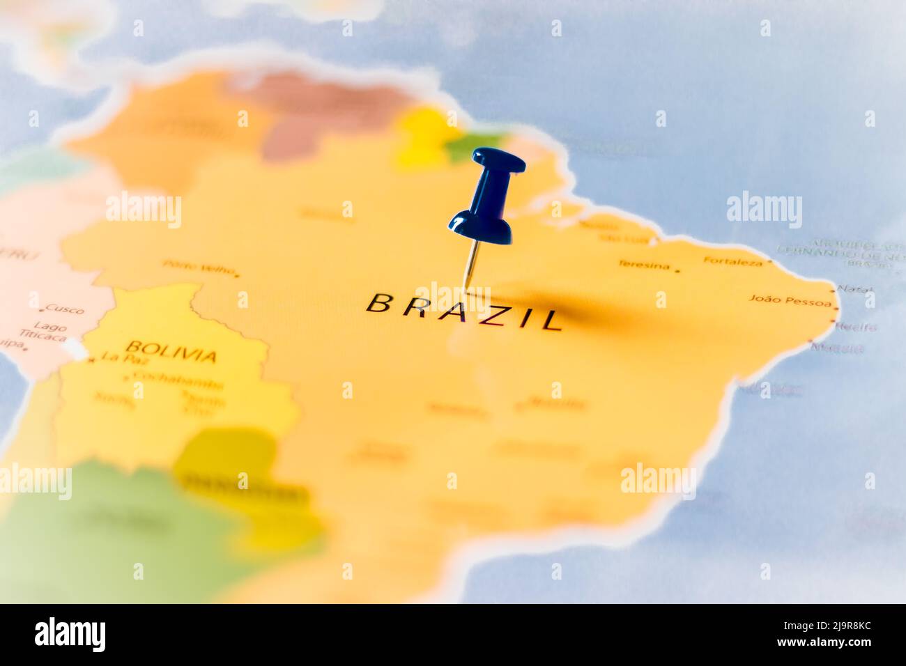 Blue push pin pointing at Brazil on a political world map Stock Photo ...