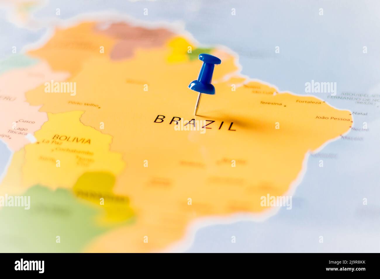 Blue push pin pointing at Brazil on a political world map Stock Photo ...