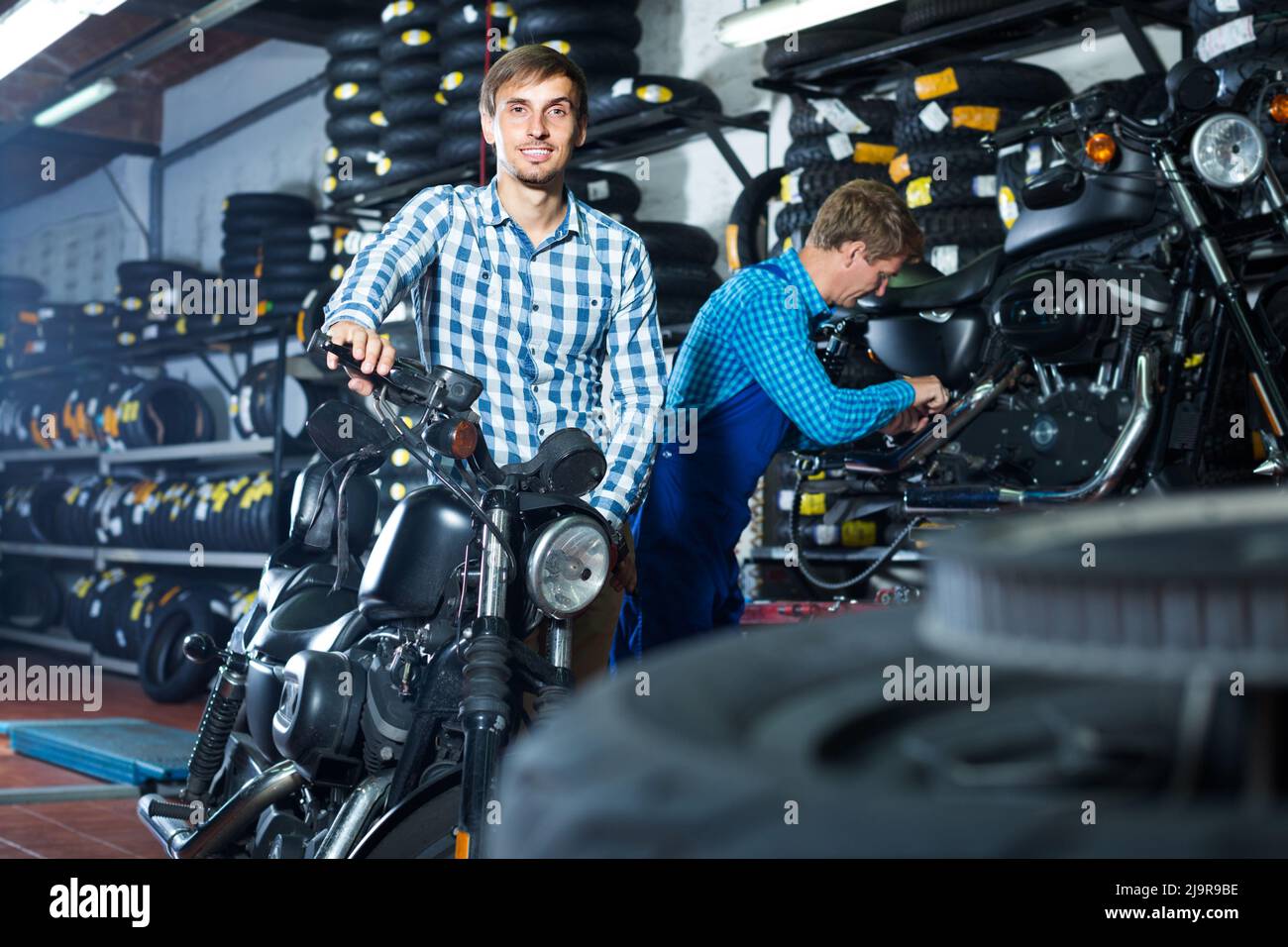 Glad smiling man customer hi-res stock photography and images - Alamy