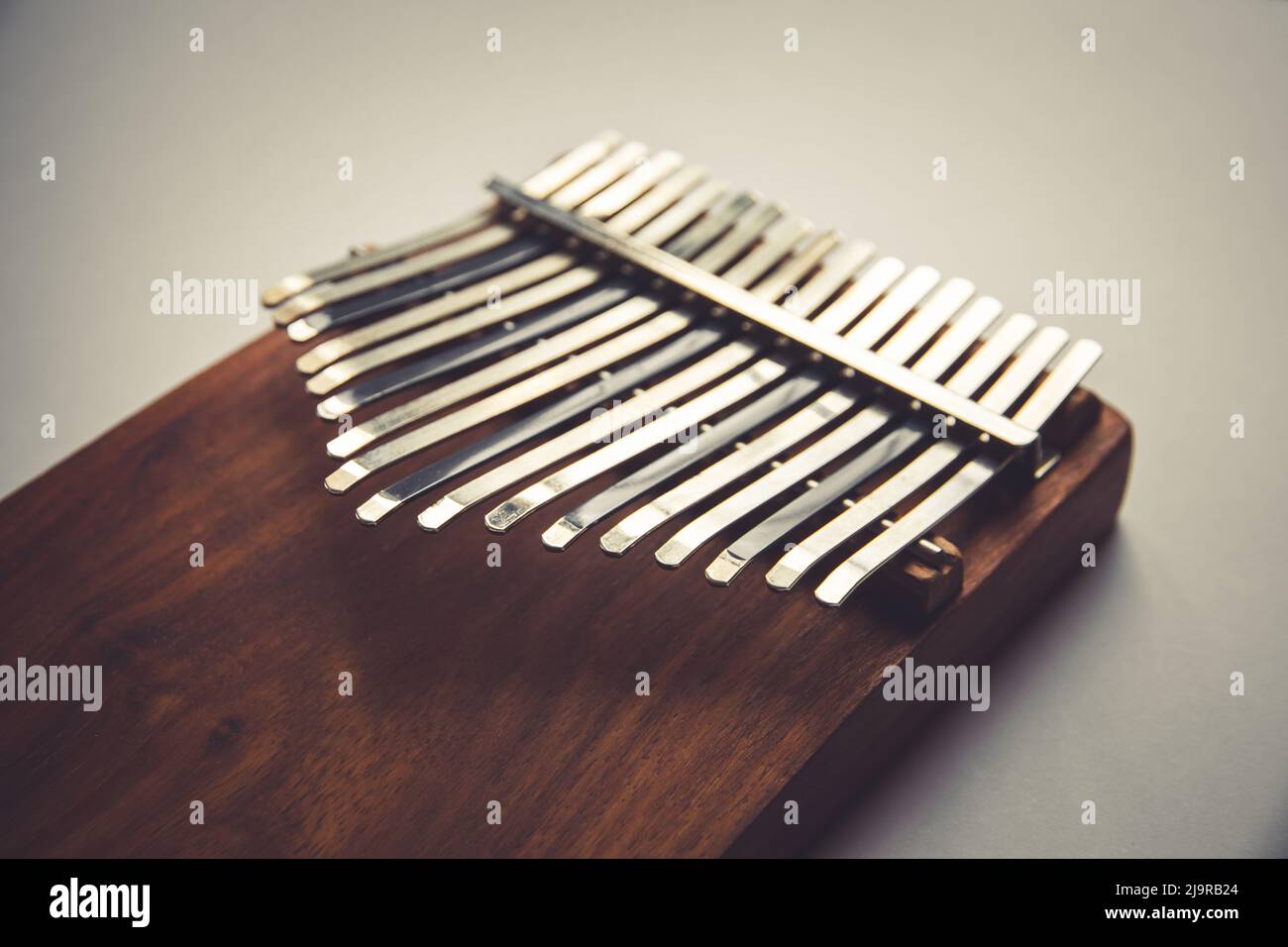 Traditional wooden kalimba isolated on white background Stock Photo - Alamy