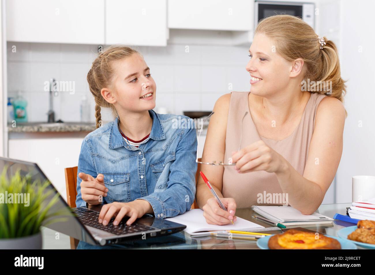 Mother child task indoors hi-res stock photography and images - Alamy