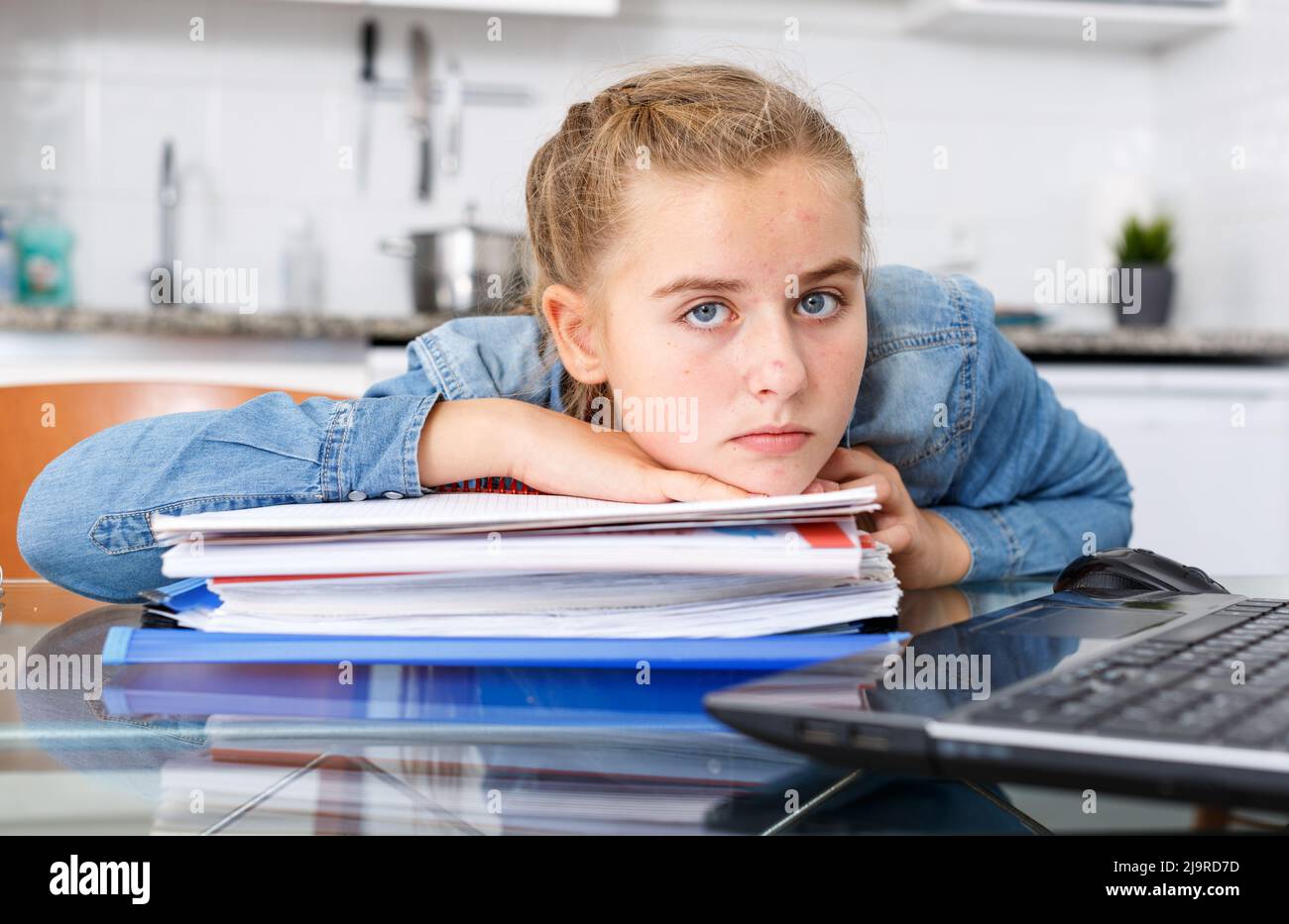 Tired of learning teenage schoolgirl Stock Photo - Alamy