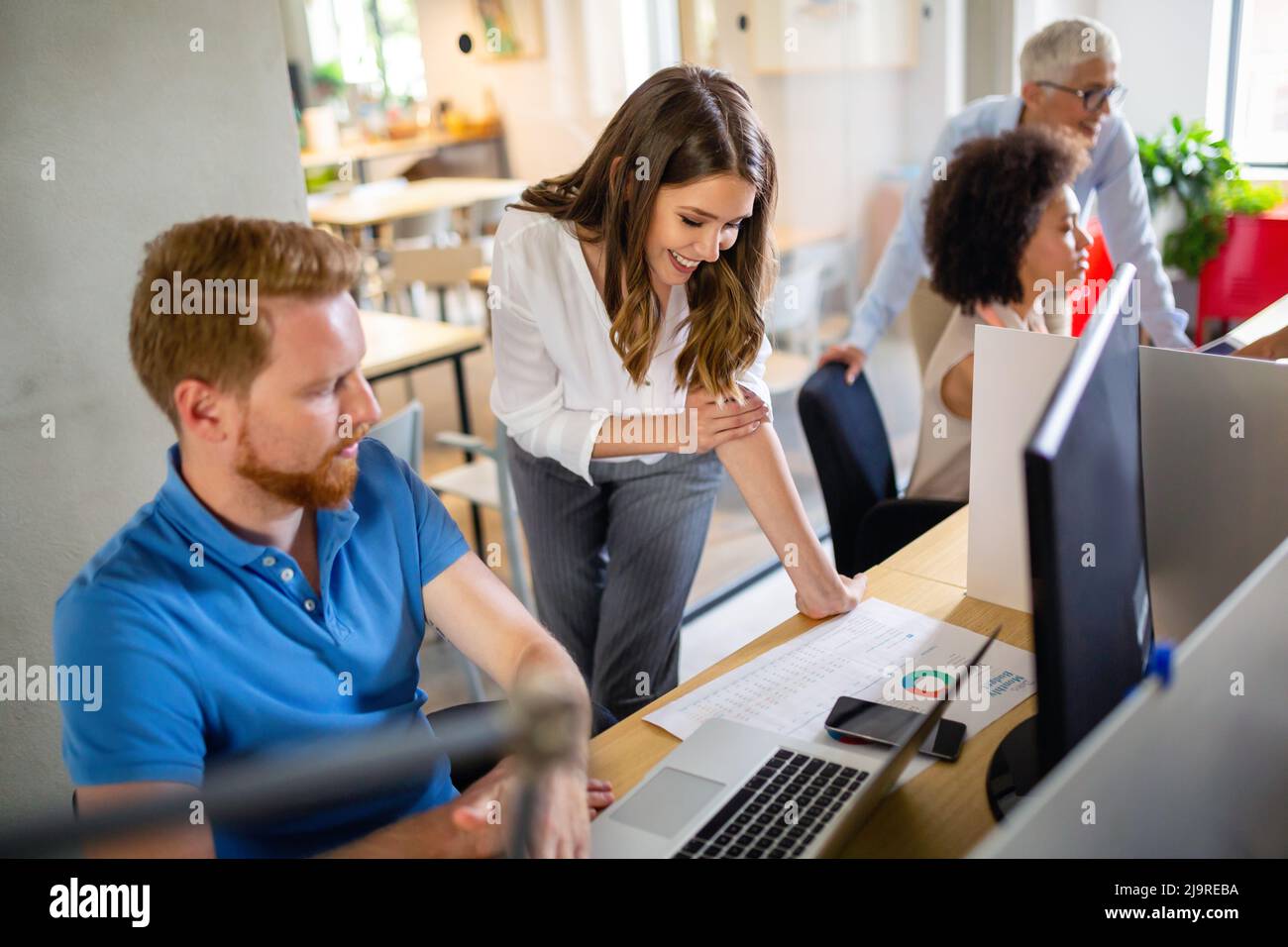 Colleagues developing software together hi-res stock photography and images - Alamy