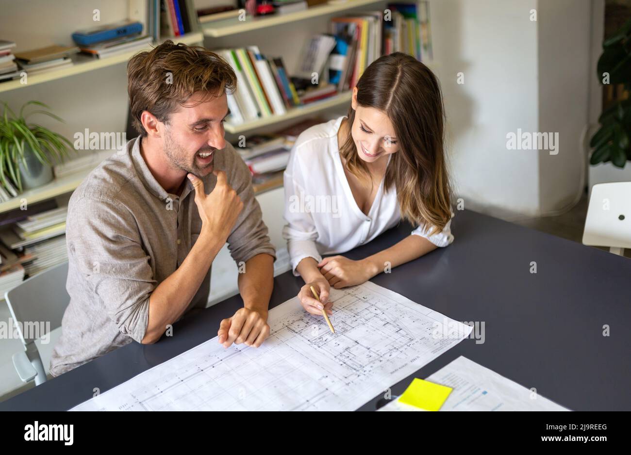 Group of business people on meeting with construction engineer ...