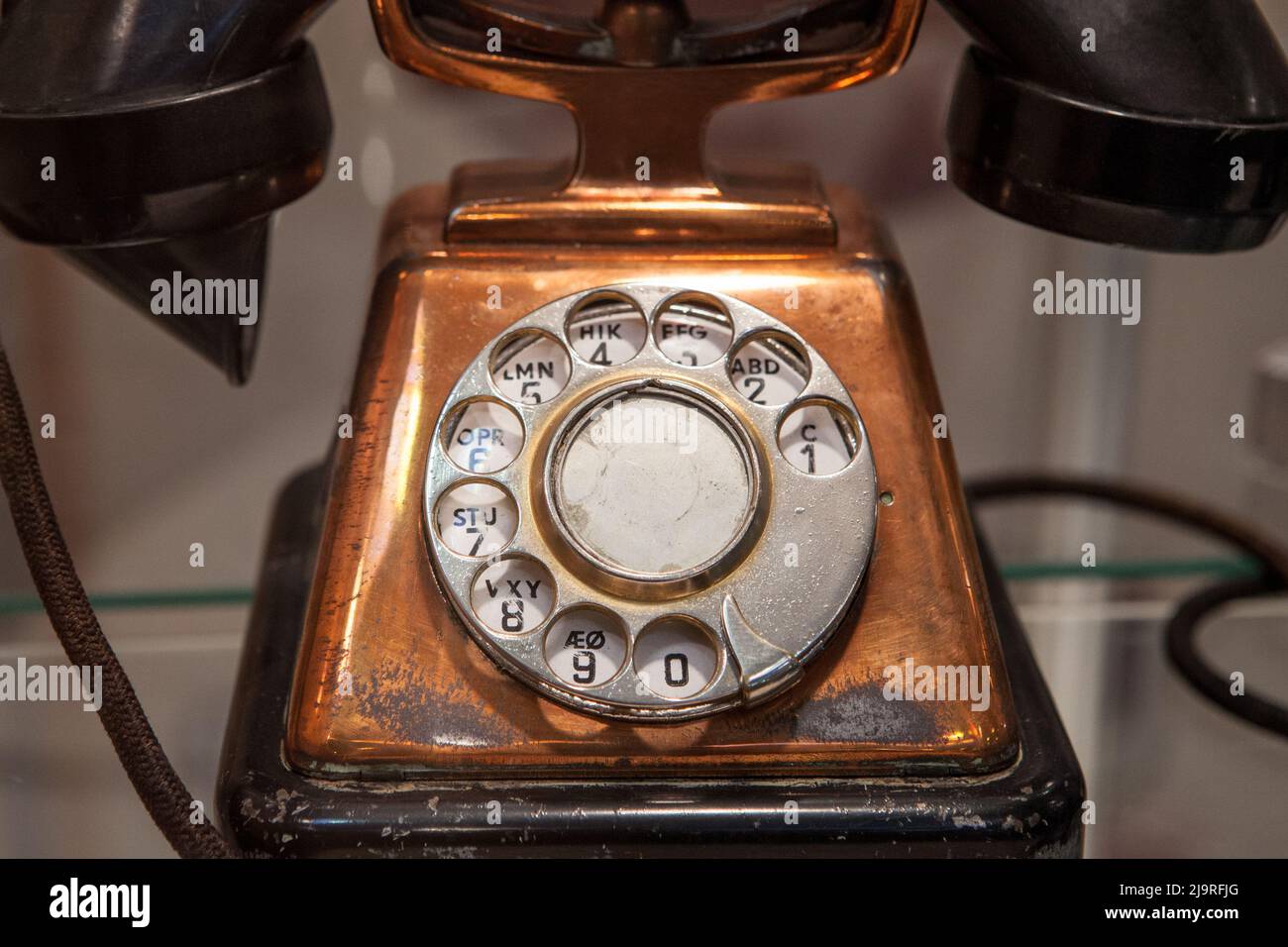 rotary dial of an old phone Stock Photo - Alamy