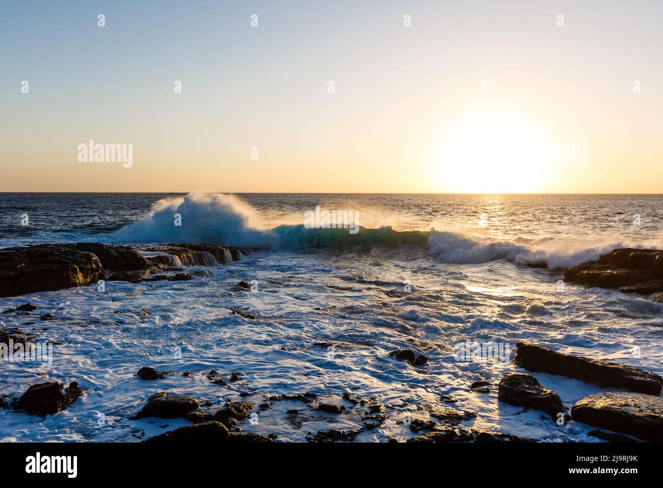 quiet sea coast with stones at the twilight, natural sea background ...
