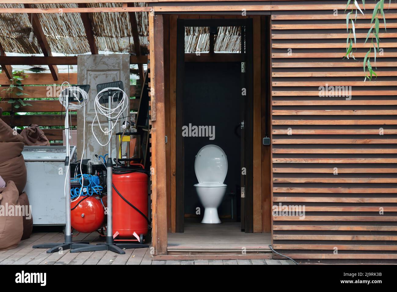 Bathroom of a summer beach bar Stock Photo - Alamy