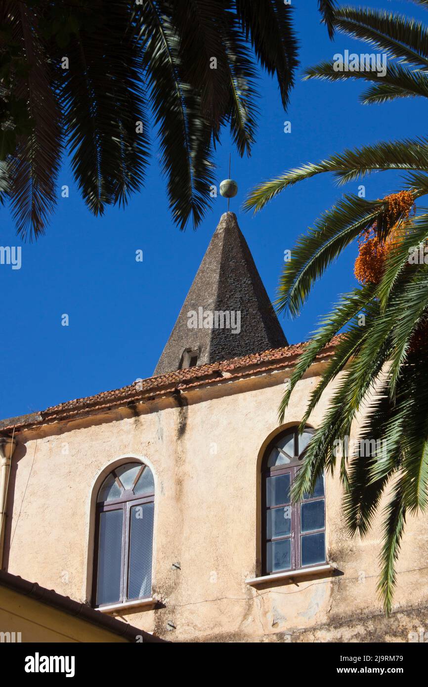 Italy, Amalfi. Bell tower and steeple of the post office in the coastal ...