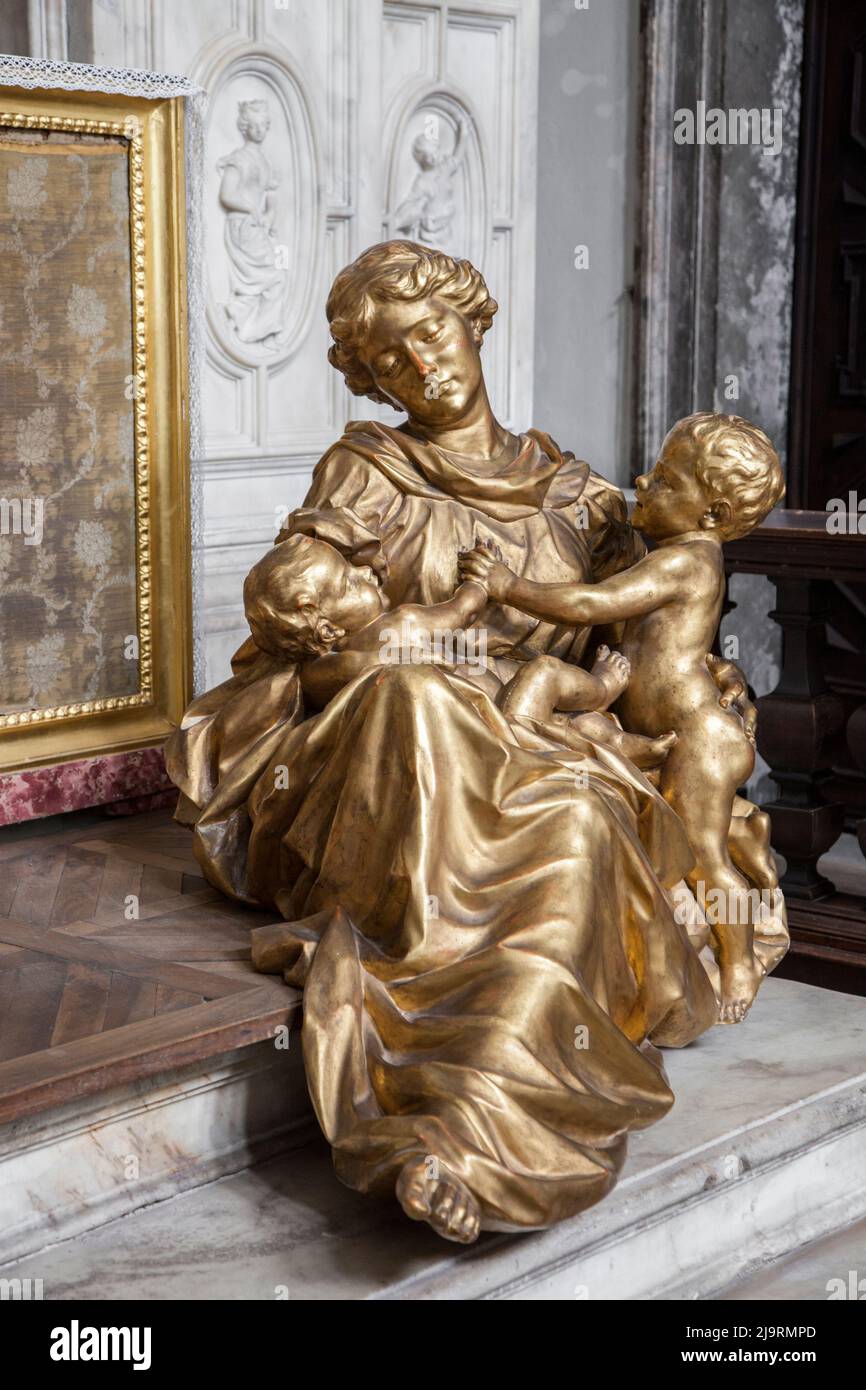 Italy, Venice. Ornate gold statues inside the Santa Maria della Salute ...
