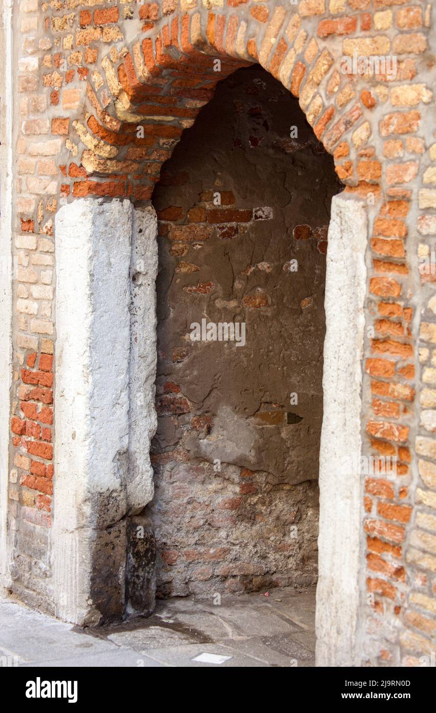 Italy, Venice. Old brick archway along the streets of Venice Stock ...